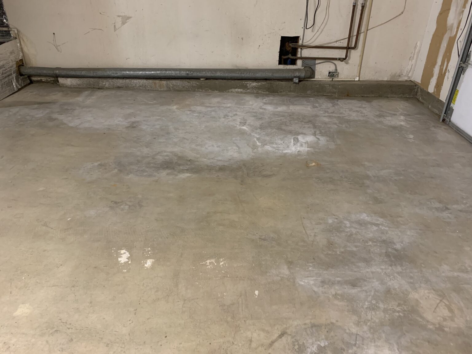 Epoxy and Polyaspartic Garage Floor Coating - The Track Ahead